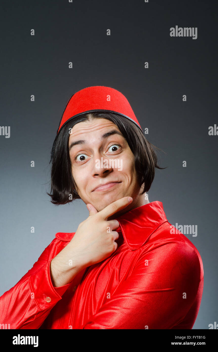 Man wearing red fez hat Stock Photo - Alamy