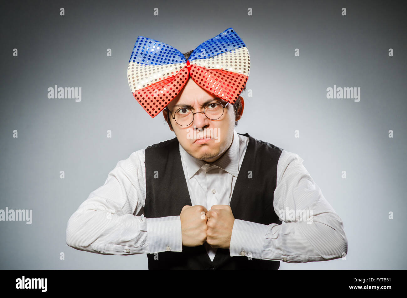Funny man with giant bow tie Stock Photo - Alamy