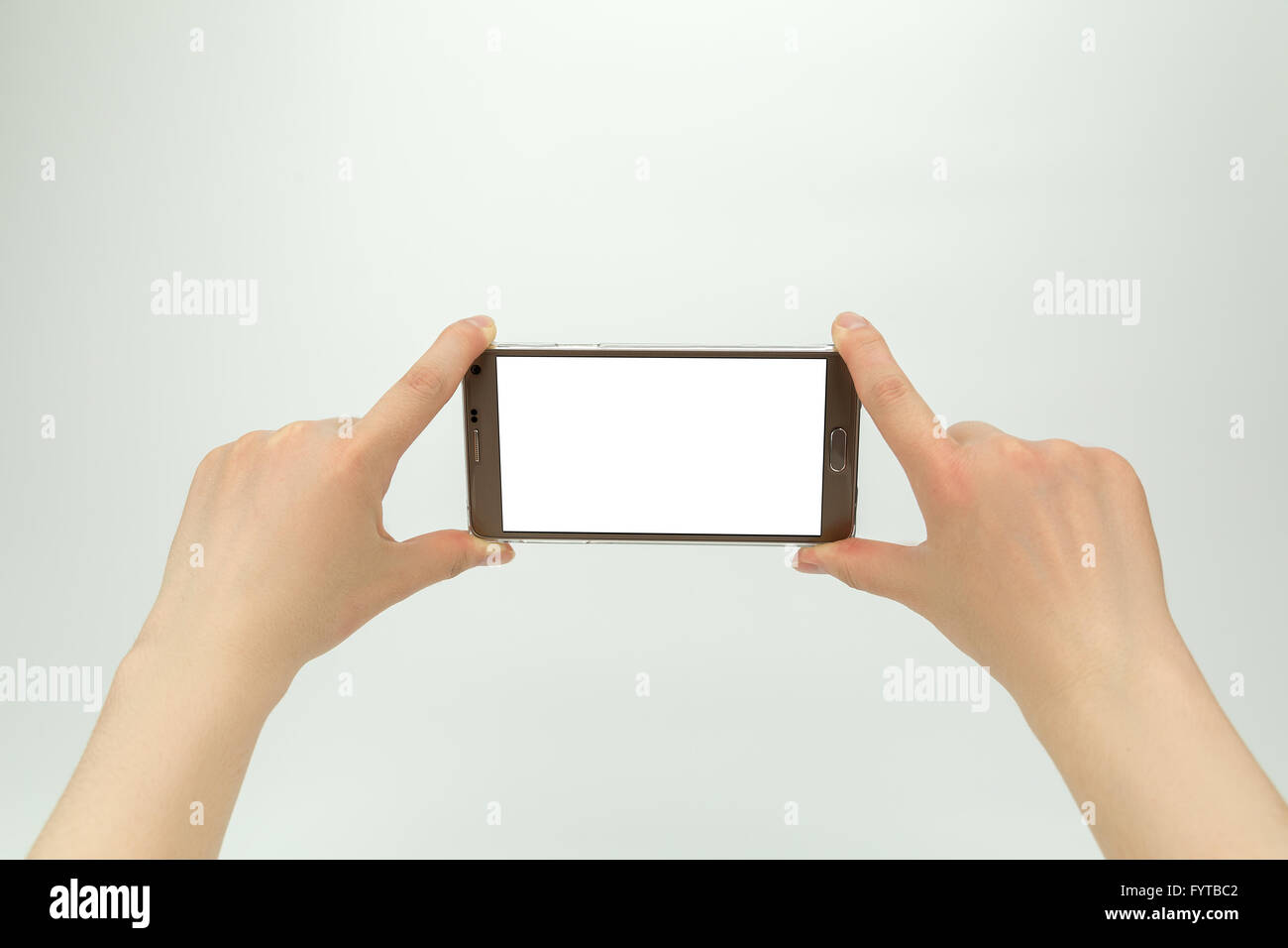 Smartphone with blank display in hands isolated Stock Photo - Alamy