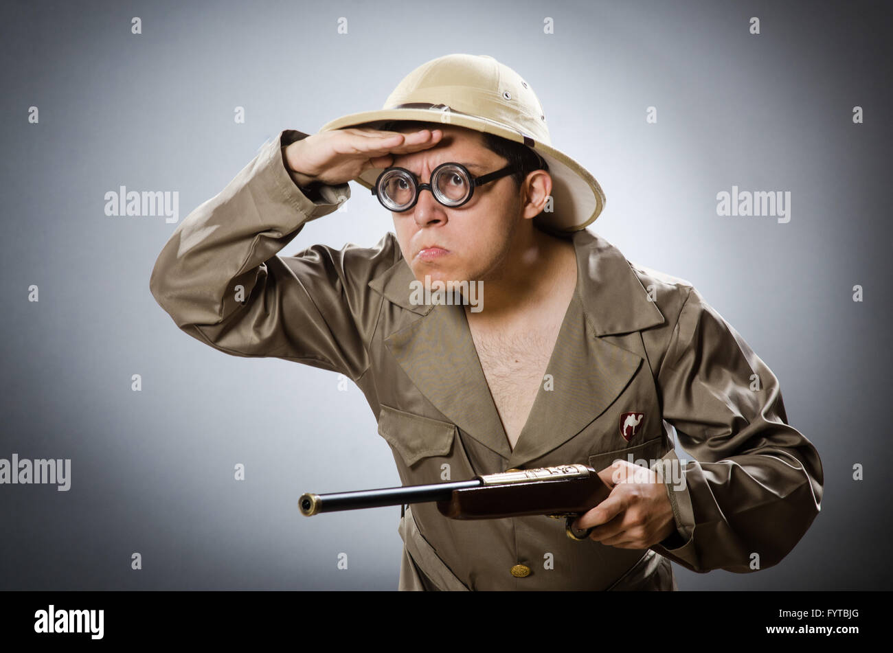 Funny hunter in hunting concept Stock Photo - Alamy