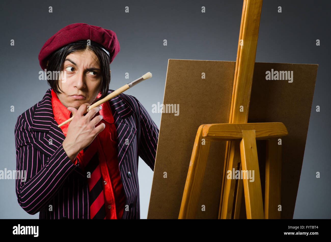 Funny artist with his artwork Stock Photo - Alamy