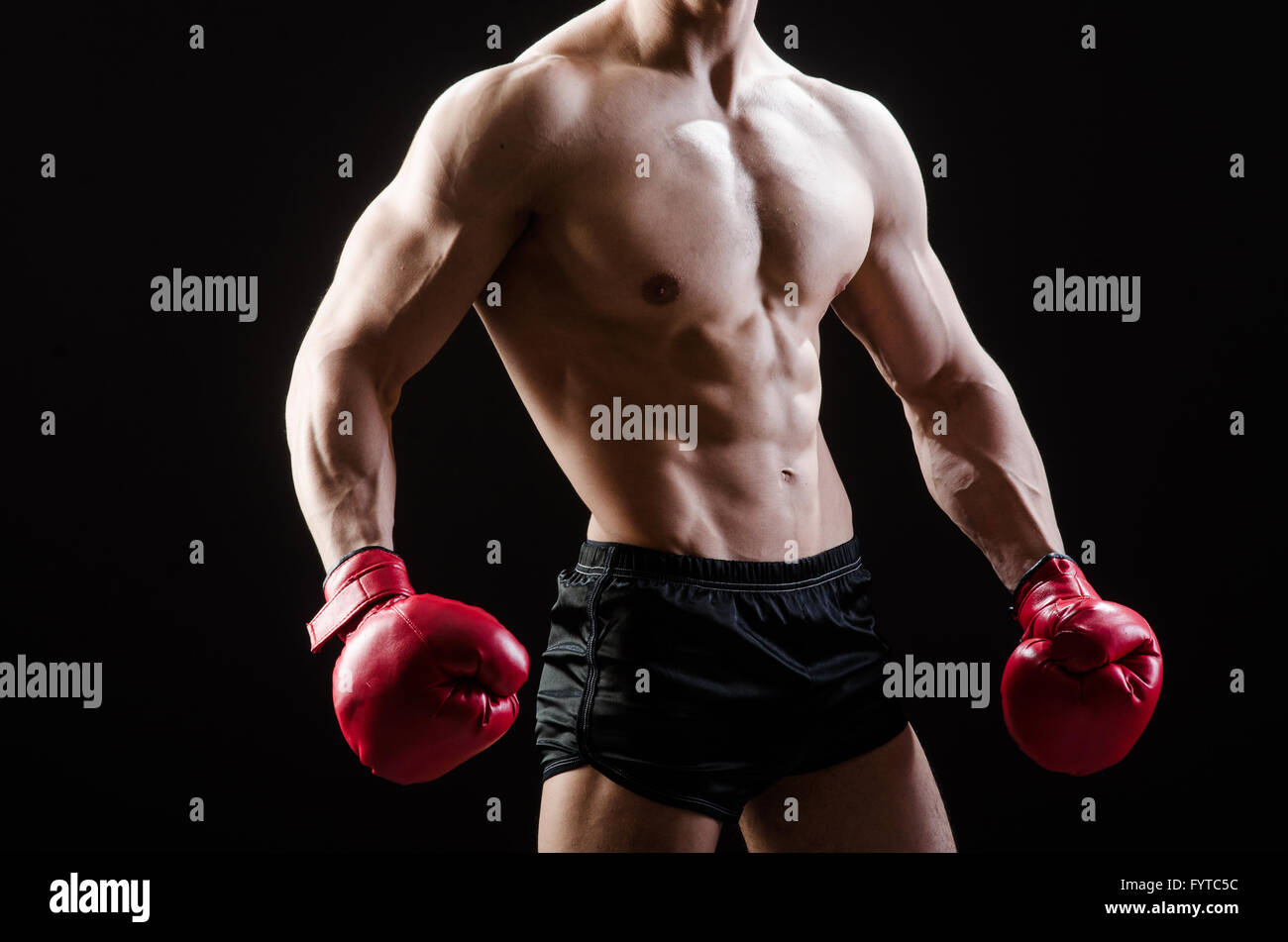 Muscular man in boxing concept Stock Photo - Alamy