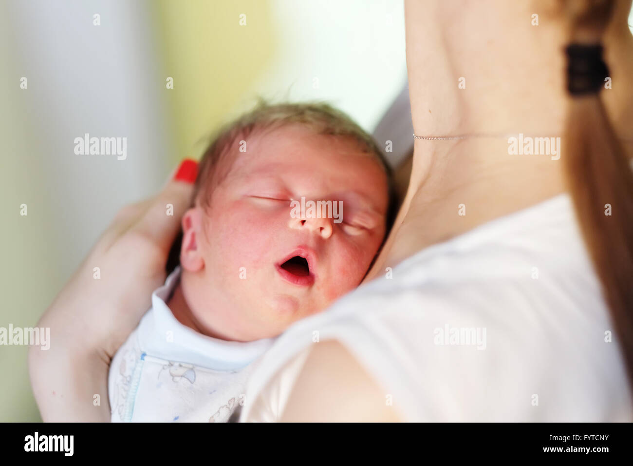 One day old newborn baby with mother Stock Photo - Alamy