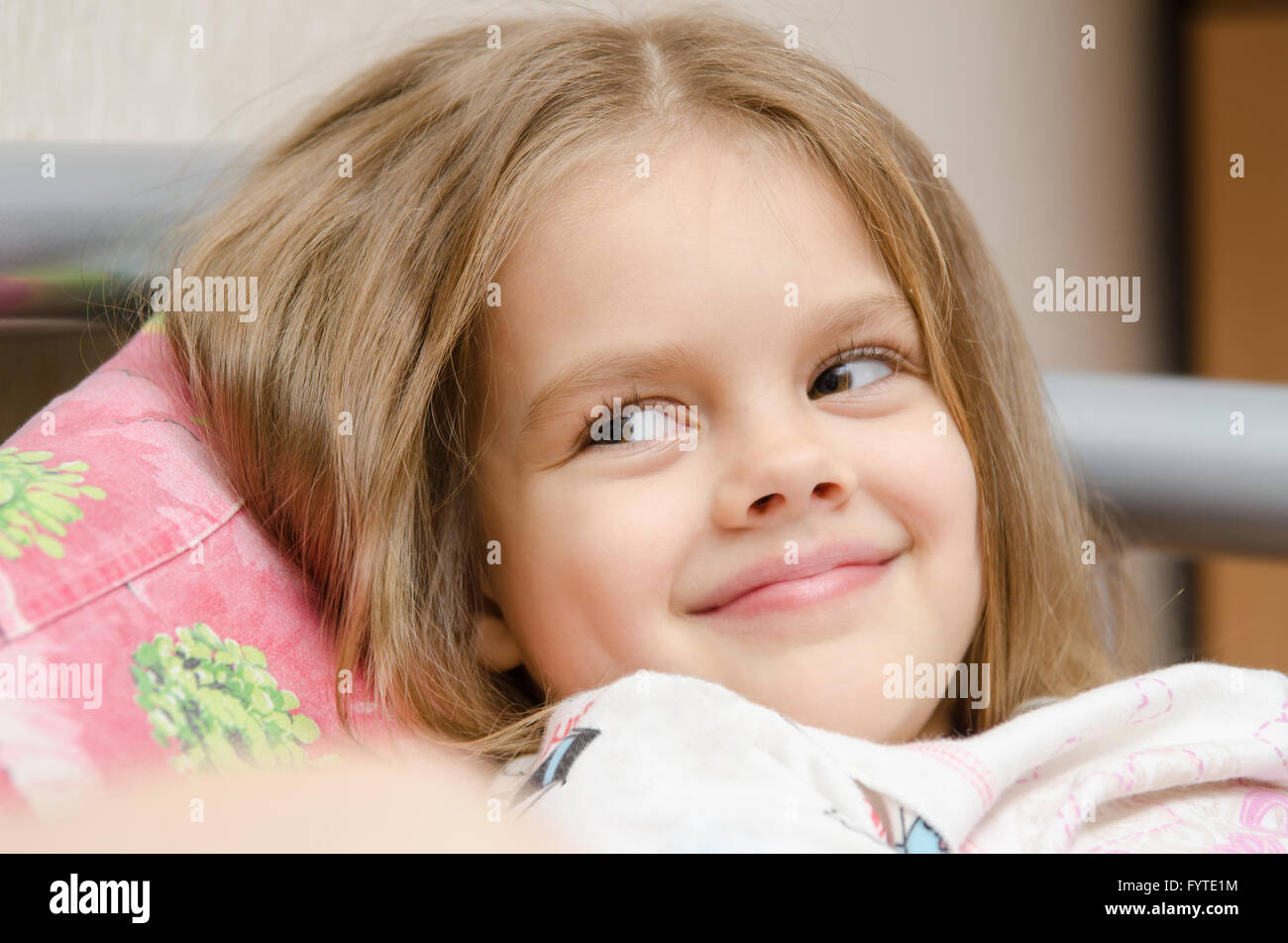 Five-year girl cute smile looking to the left Stock Photo - Alamy