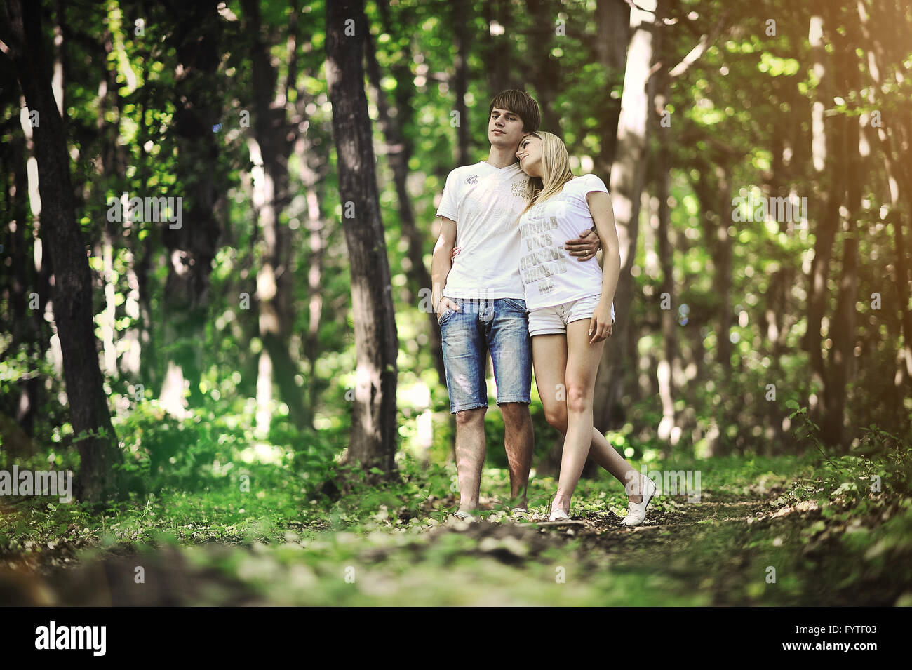 Romantic couple on forest Stock Photo - Alamy