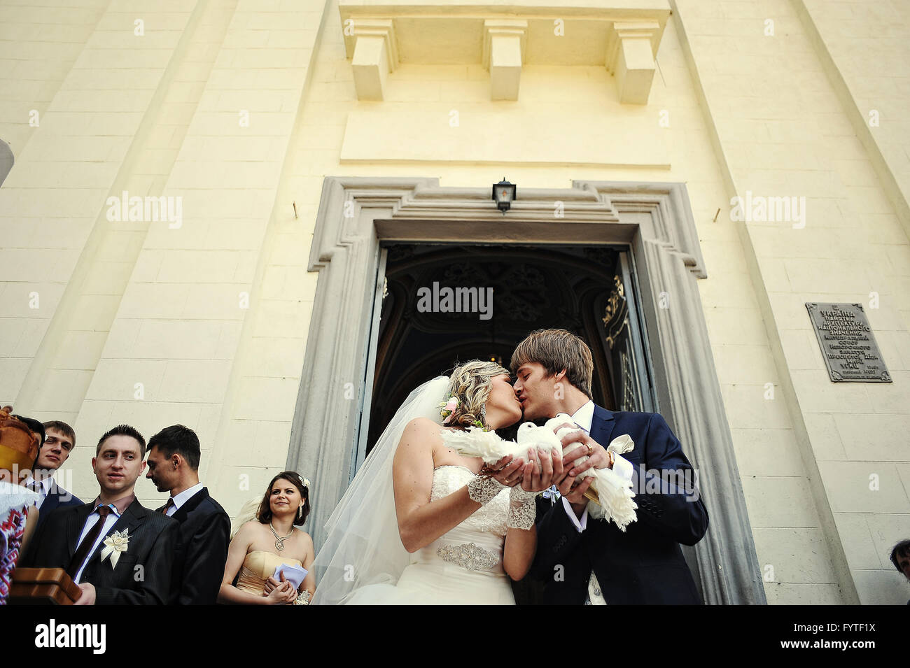 wedding couple at the church Stock Photo - Alamy