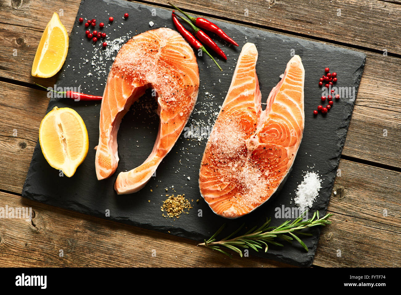 Raw salmon steaks Stock Photo - Alamy