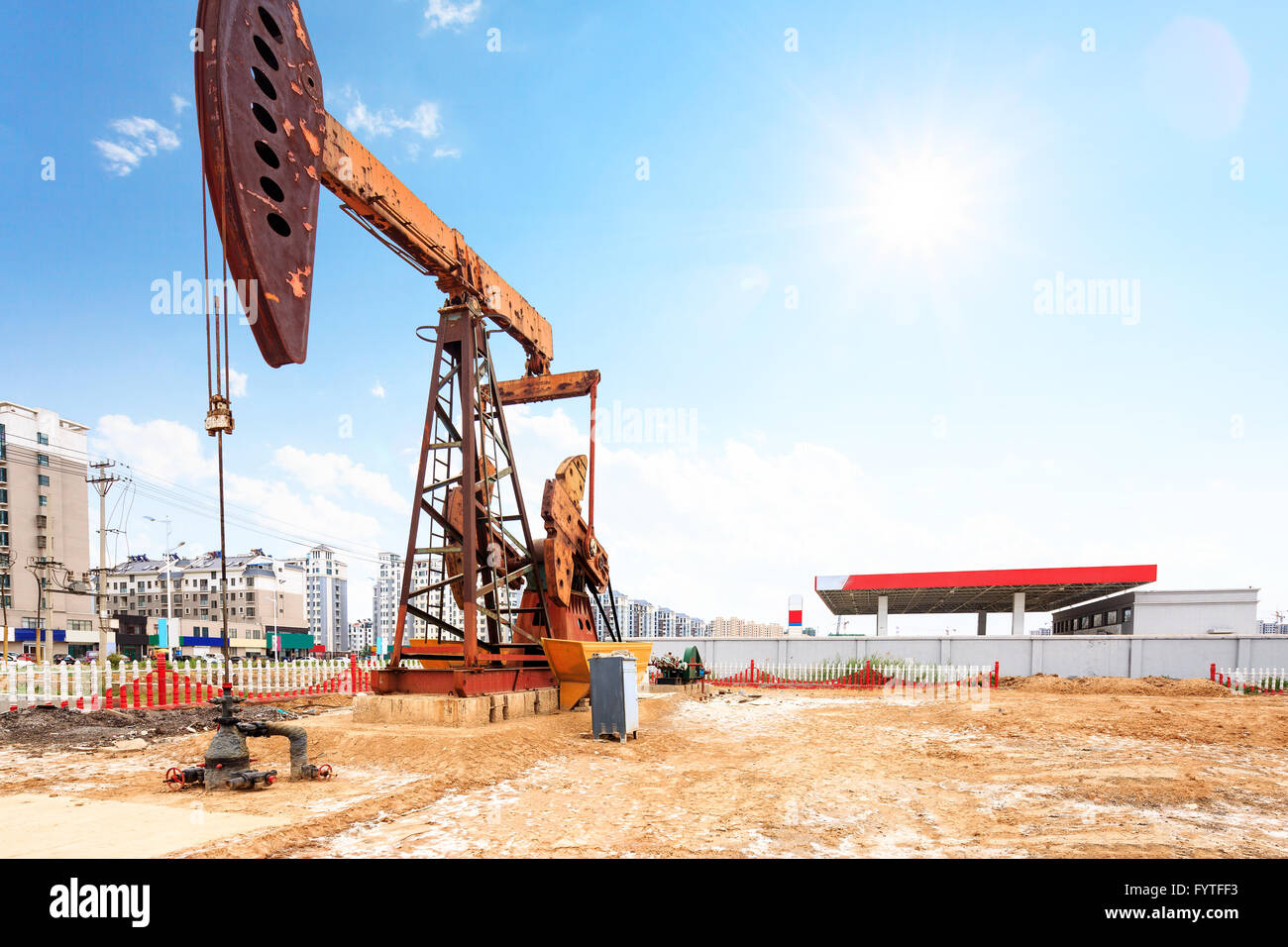 skyline and working oil-rig in oilfield Stock Photo - Alamy