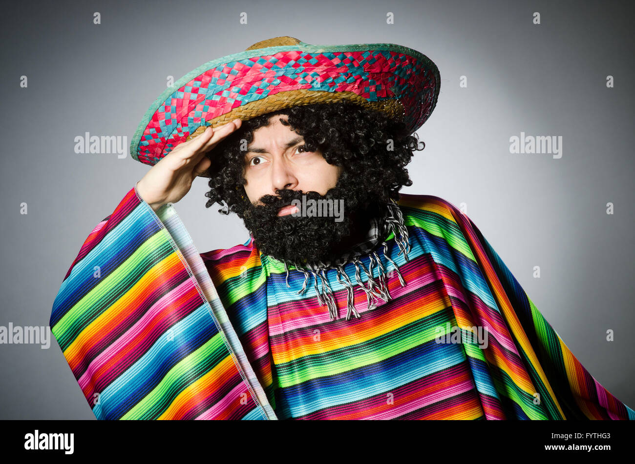 Person wearing sombrero hat in funny concept Stock Photo - Alamy