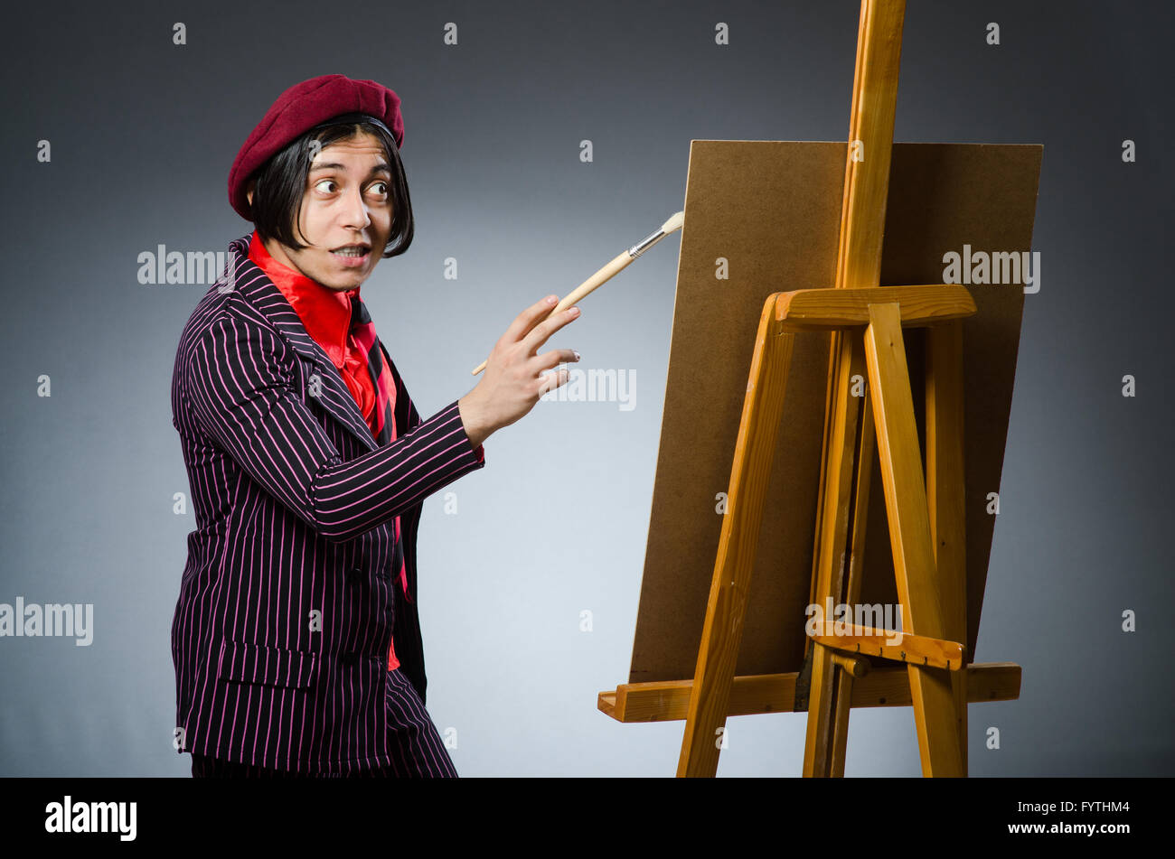 Funny artist with his artwork Stock Photo - Alamy