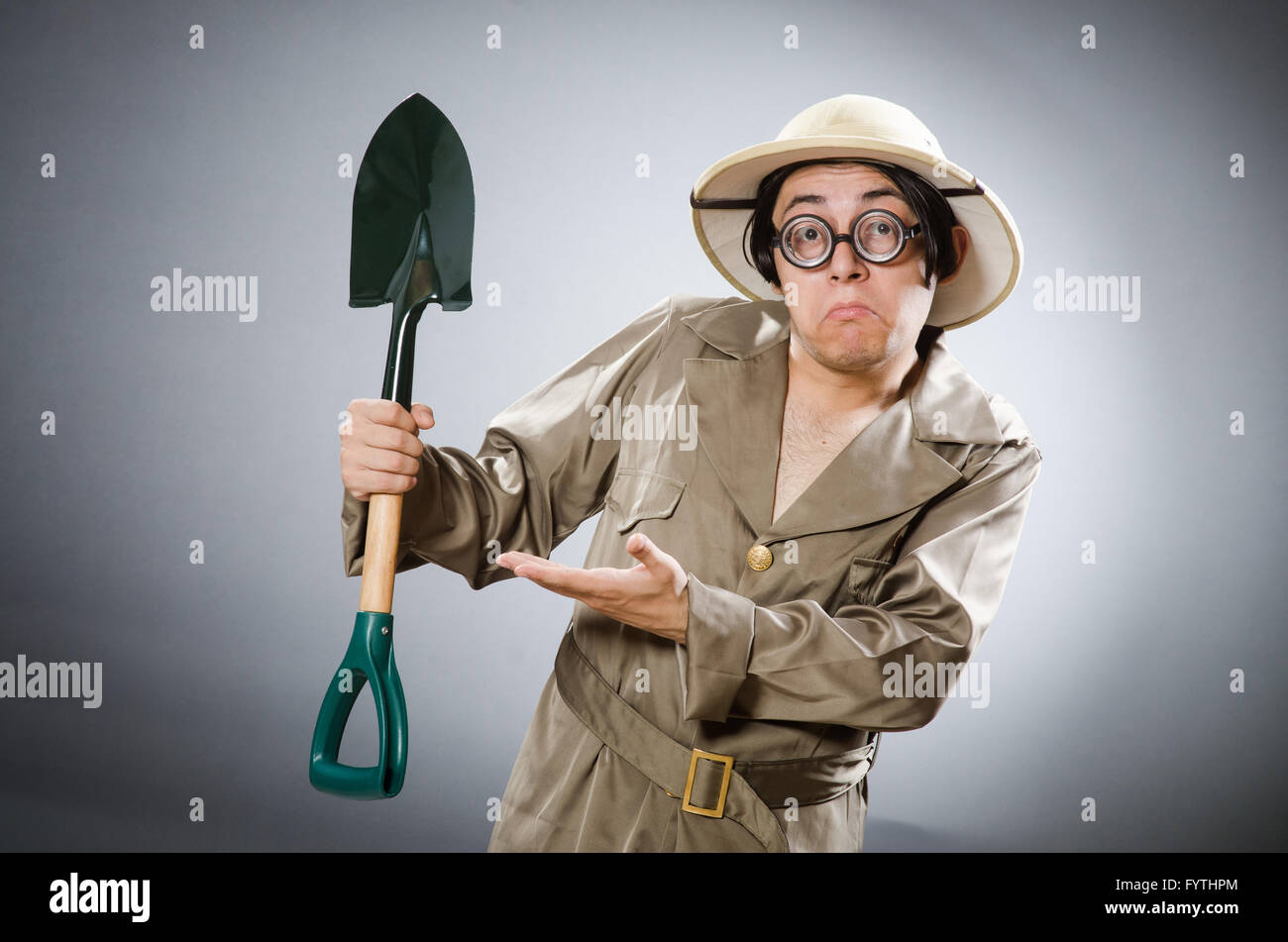 Funny safari traveller in travelling concept Stock Photo - Alamy