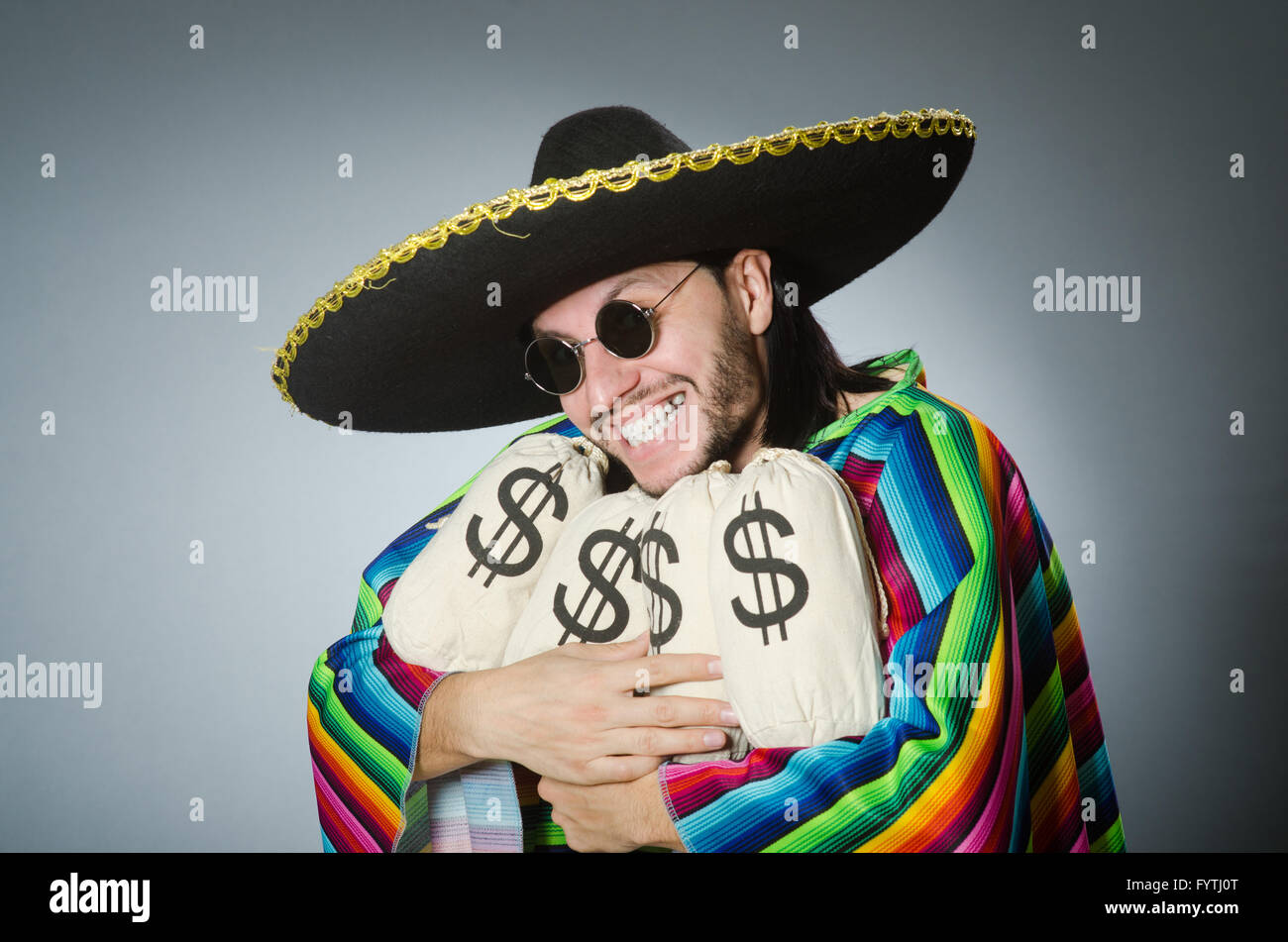 Mexican man with money sacks Stock Photo - Alamy