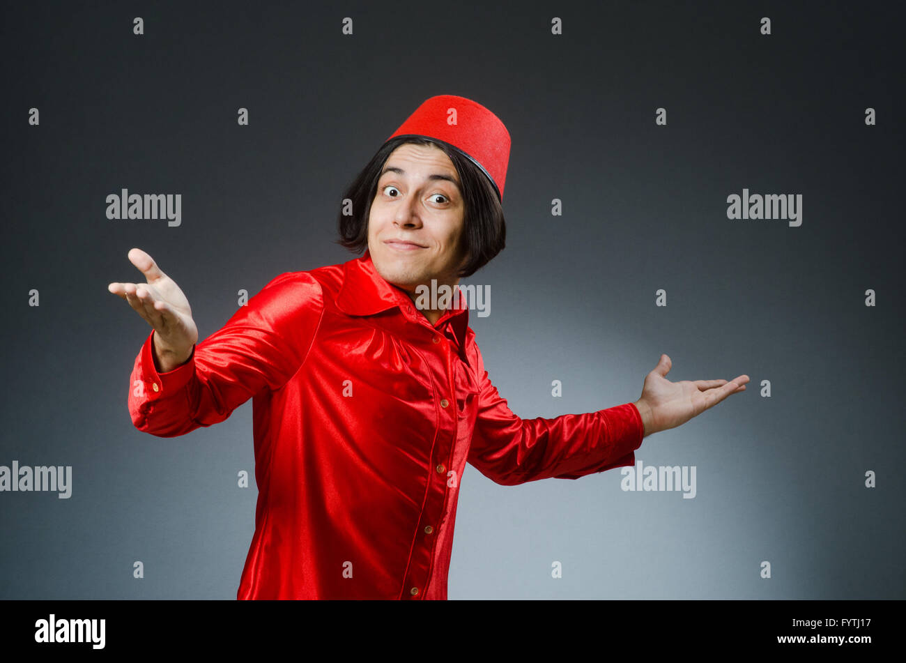 Man wearing red fez hat Stock Photo - Alamy
