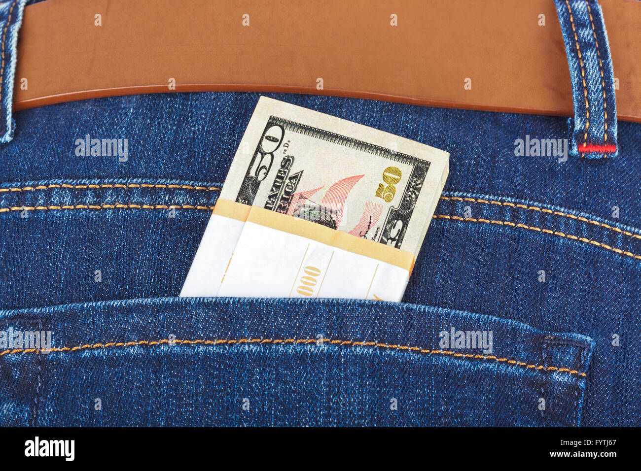 Money in jeans pocket Stock Photo - Alamy
