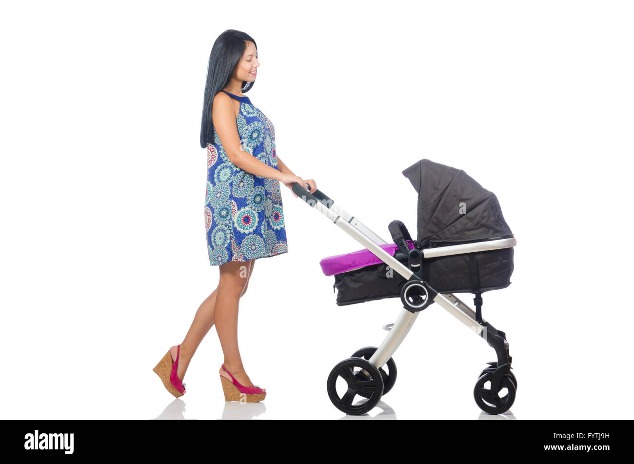 Happy mom with her baby in pram Stock Photo - Alamy