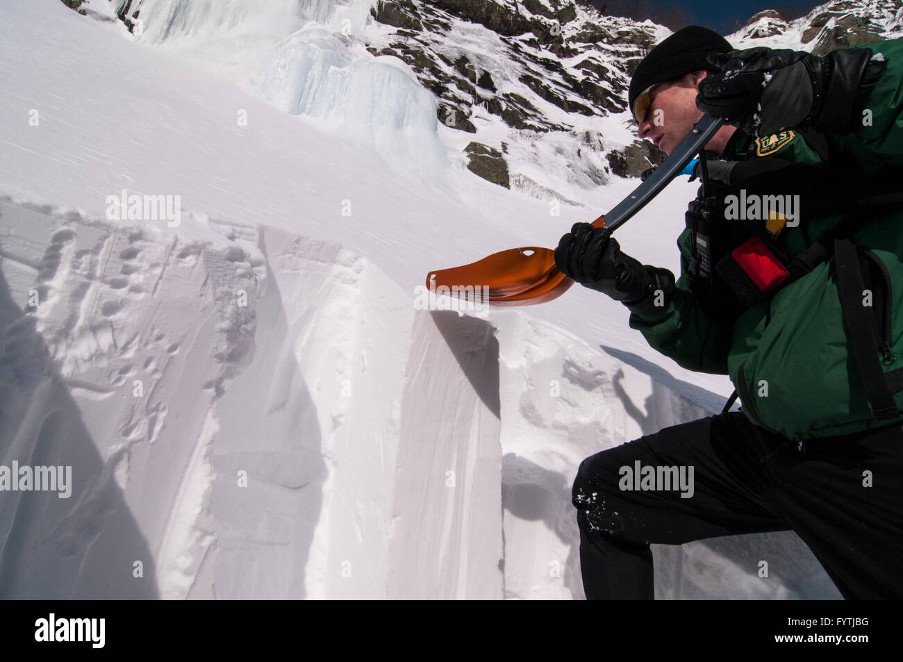 Avalanche forecaster preparing a compression test in the slopes of ...