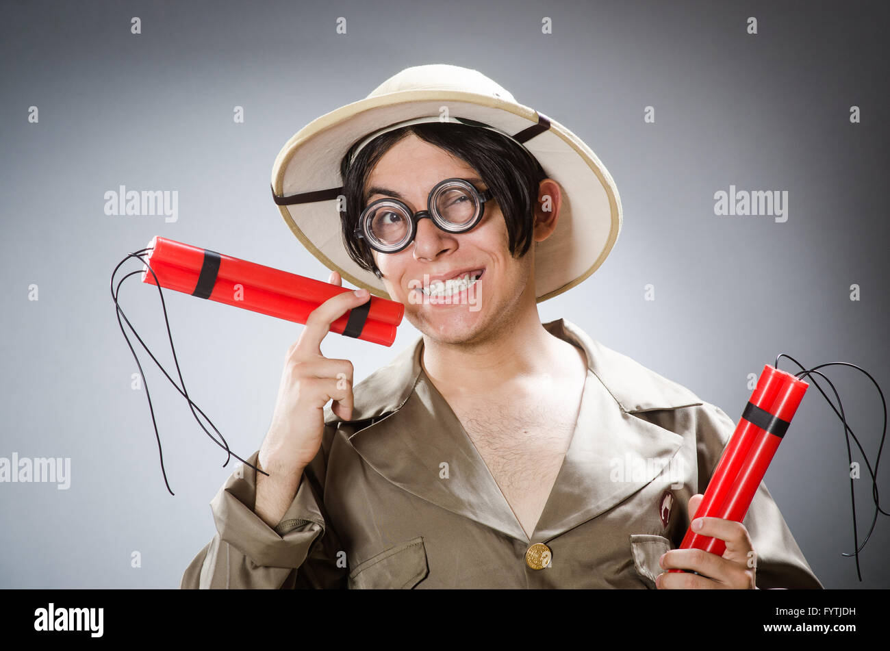 Funny safari traveller in travelling concept Stock Photo - Alamy