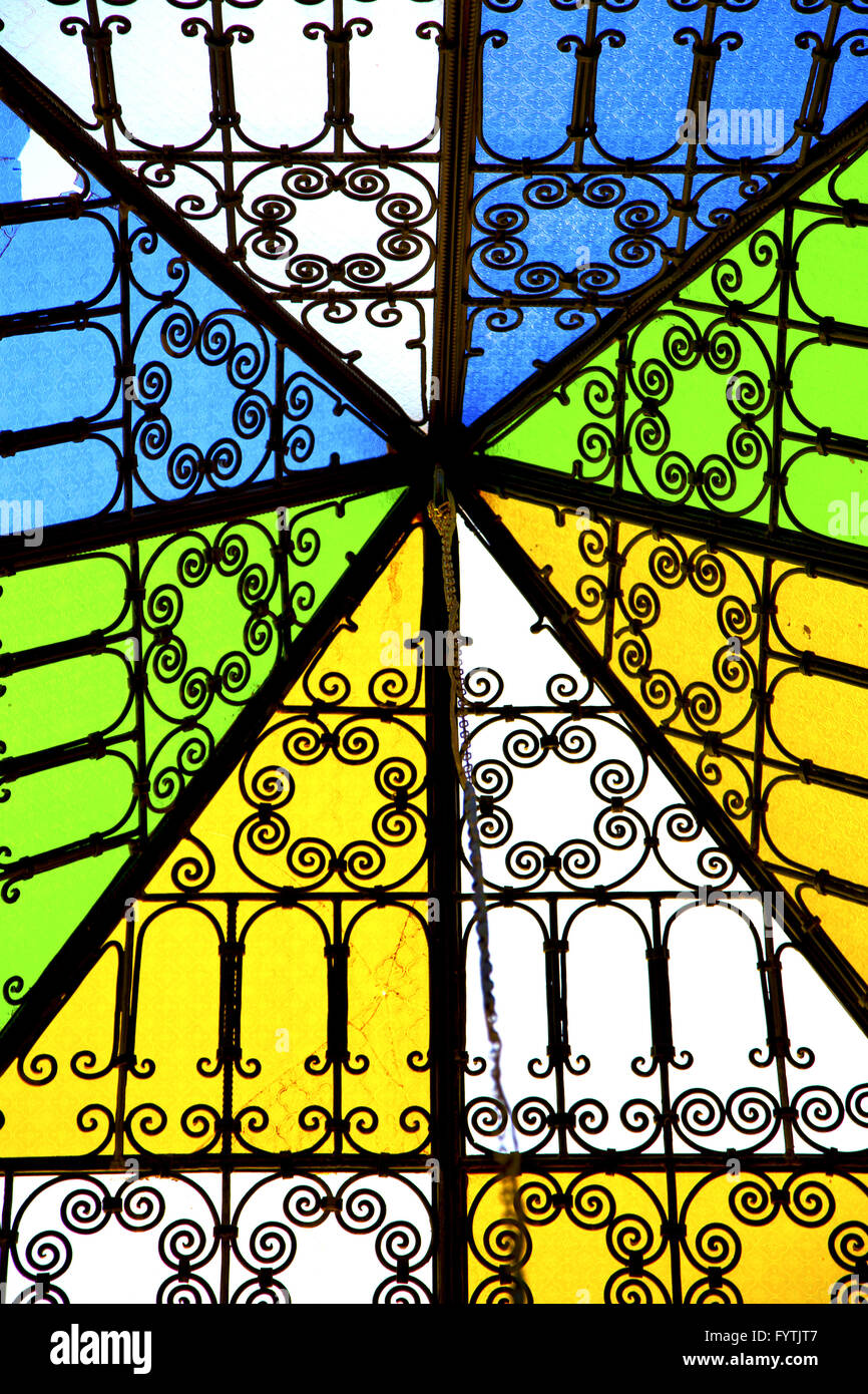 colorated glass sun in window and light Stock Photo - Alamy