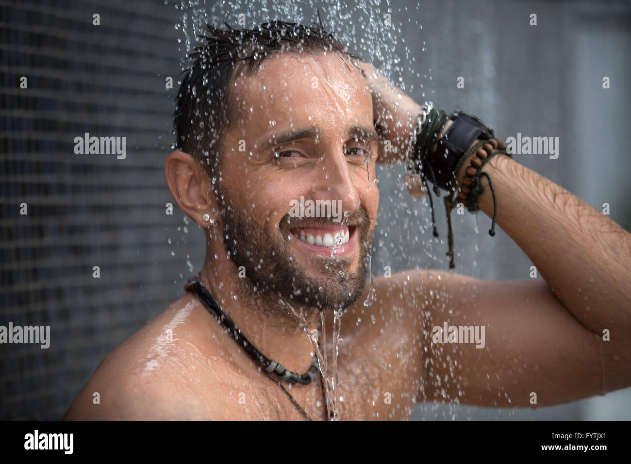 Man in shower Stock Photo - Alamy