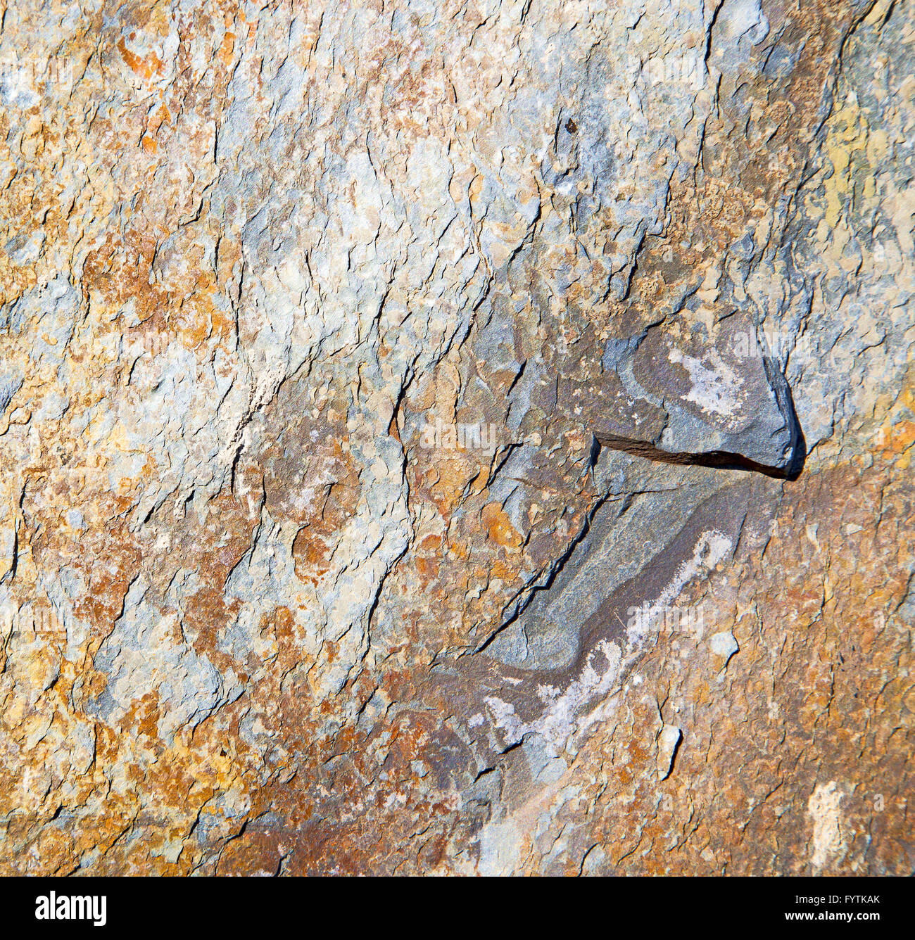 rocks stone and red orange gneiss in the wall of morocco Stock Photo ...