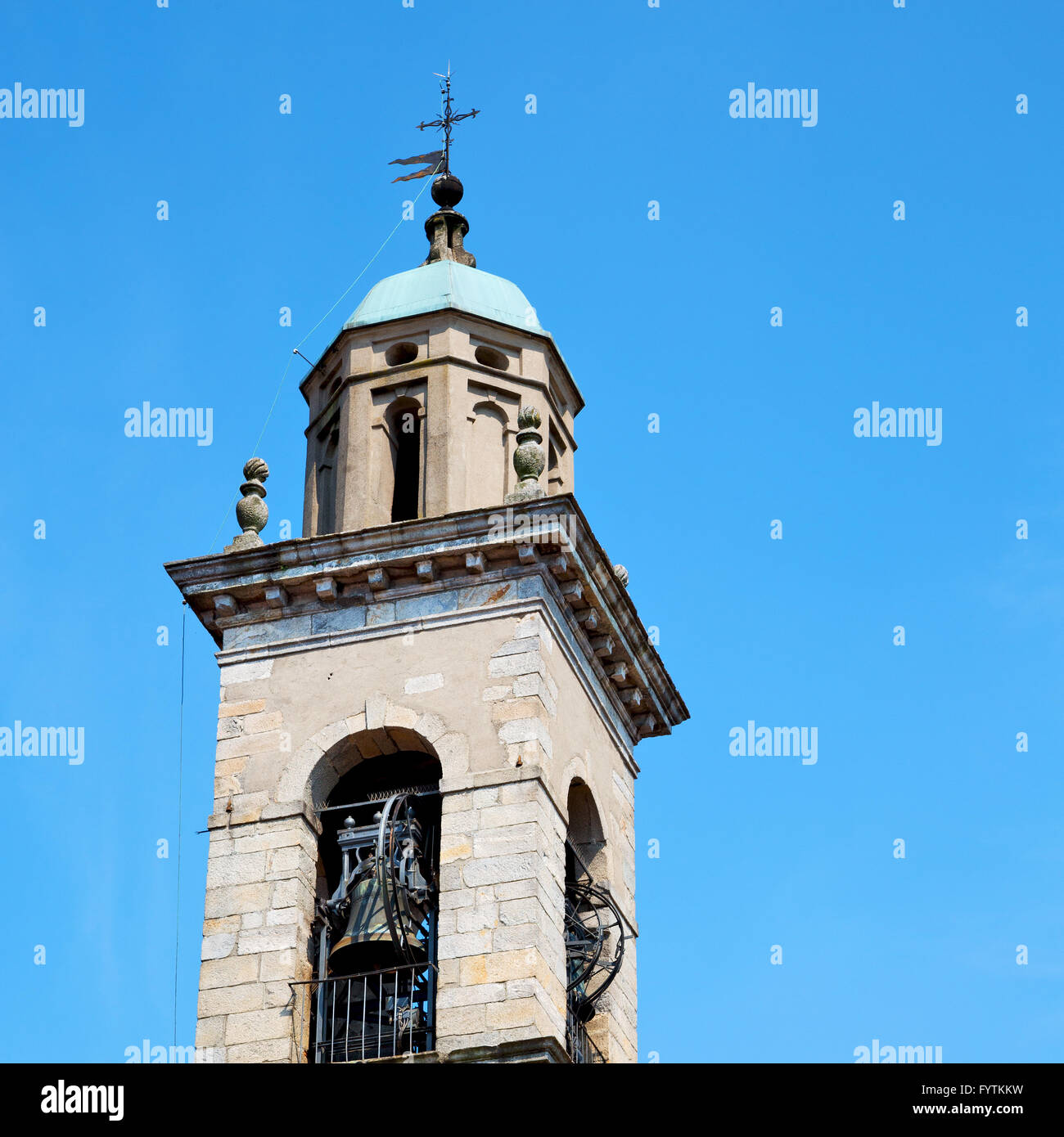 monument clock tower in italy europe old stone and bell Stock Photo - Alamy