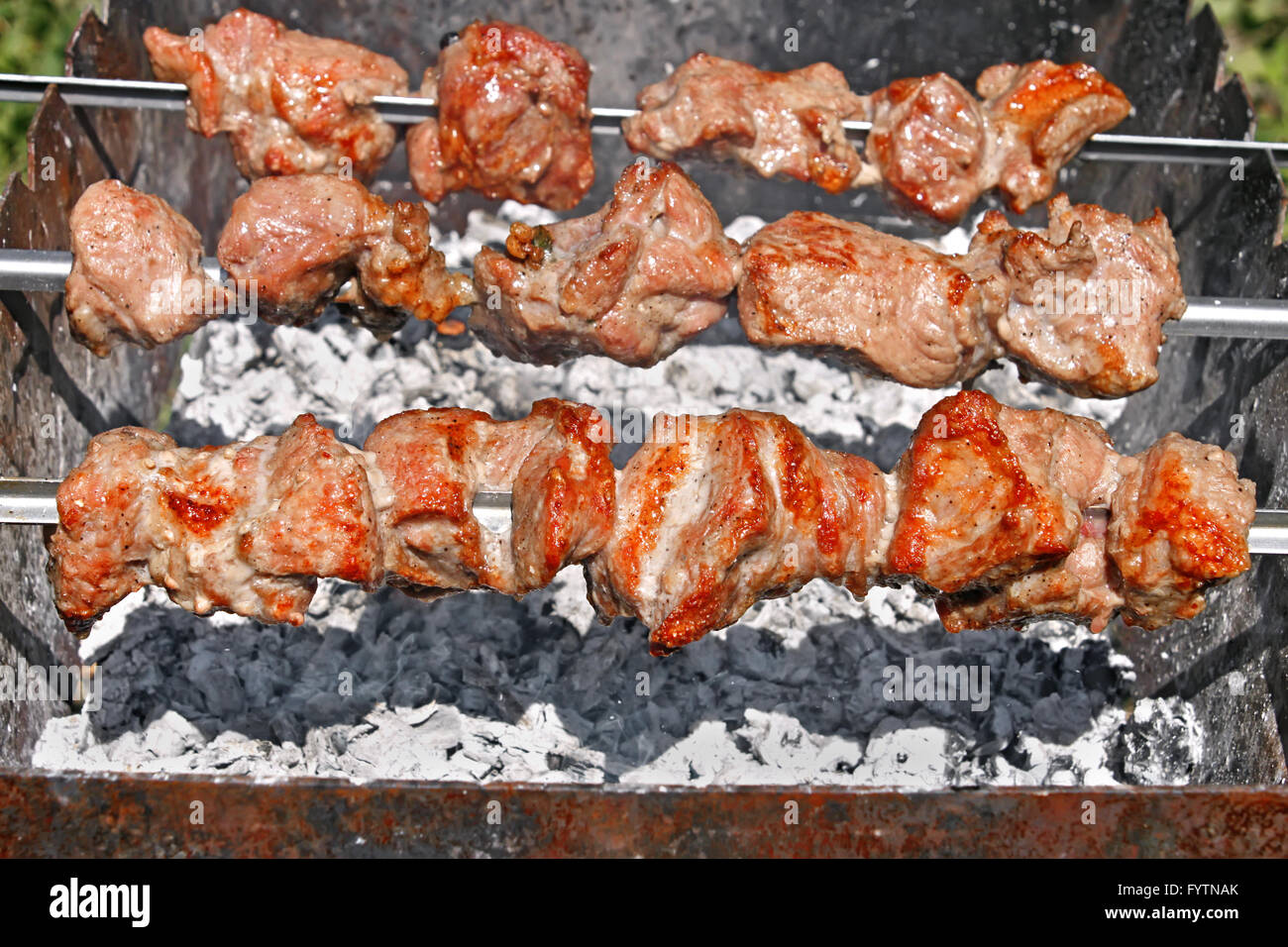Shish kebab on still skewers Stock Photo - Alamy