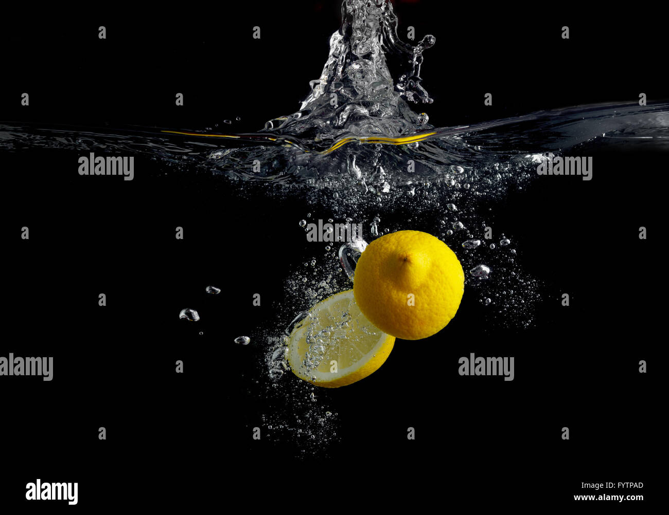 Closeup lemon splashing liquid in hi-res stock photography and images ...