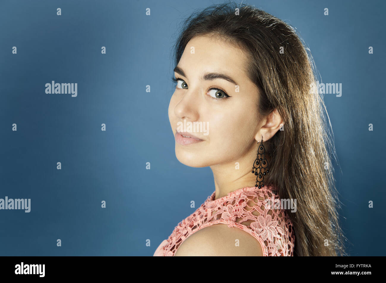 Beautiful girl looks back Stock Photo - Alamy