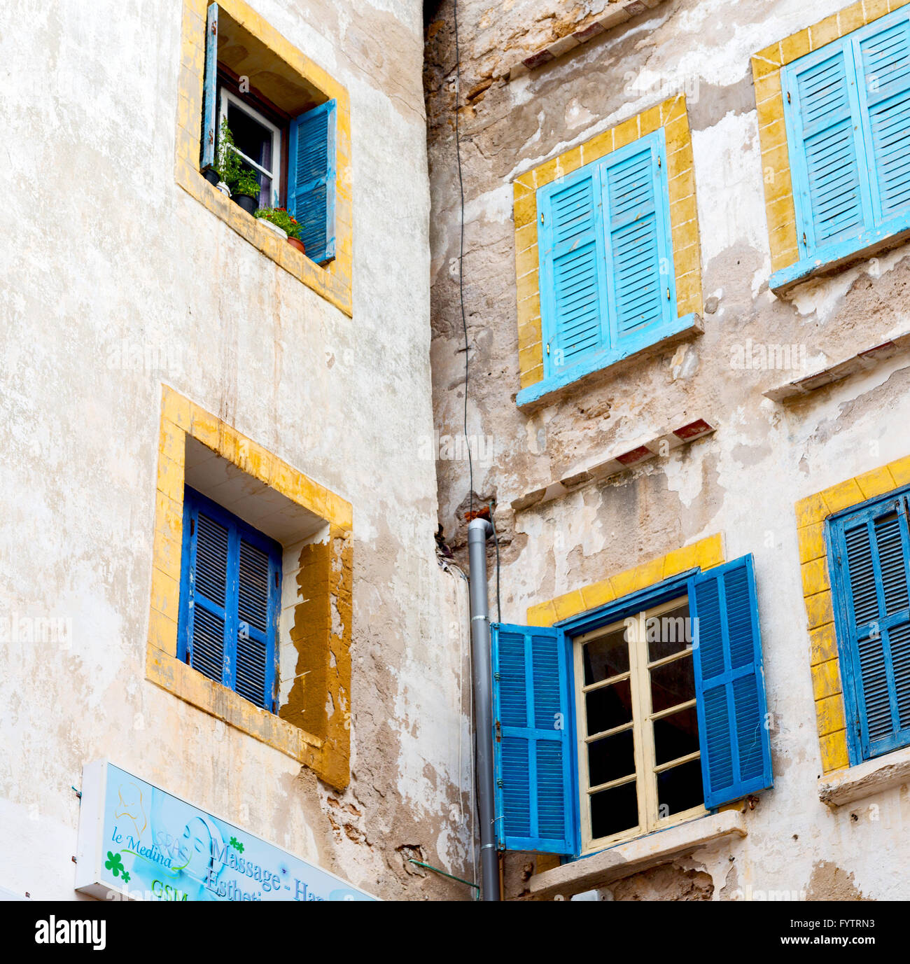 blue window in morocco africa old construction and brown wall ...