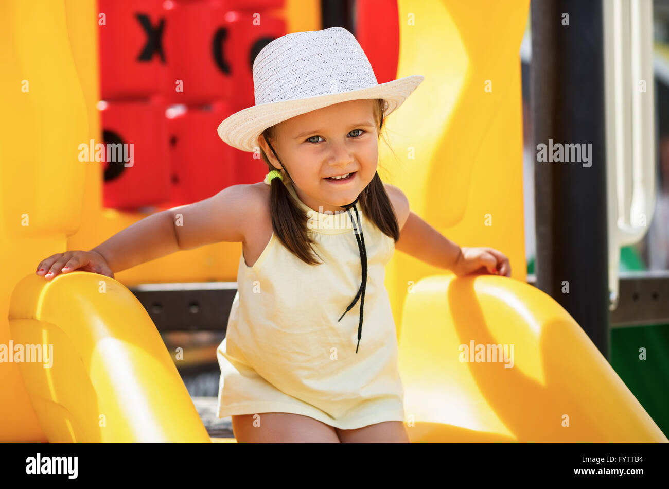Child on the playground Stock Photo - Alamy