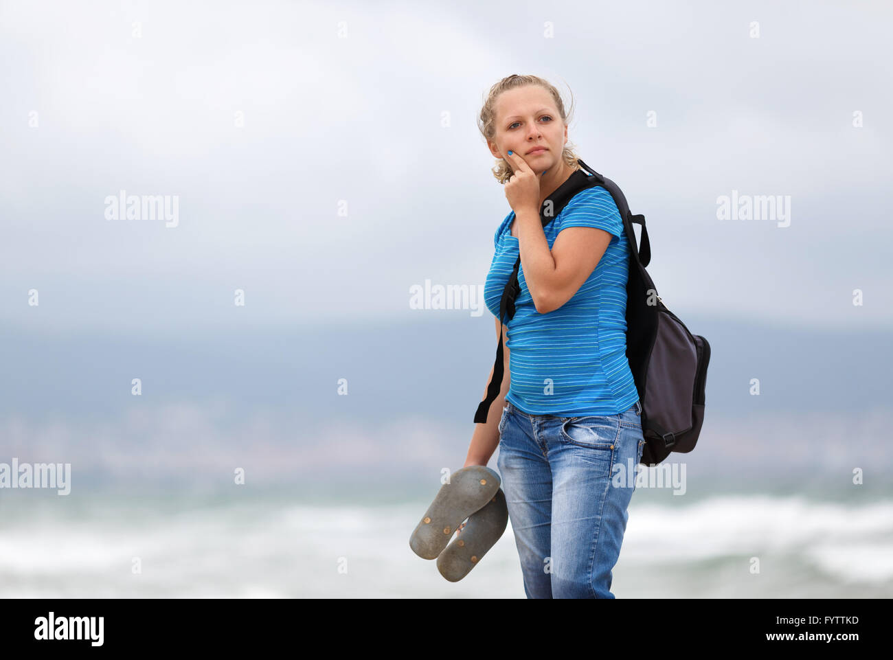 Girl with a backpack Stock Photo - Alamy