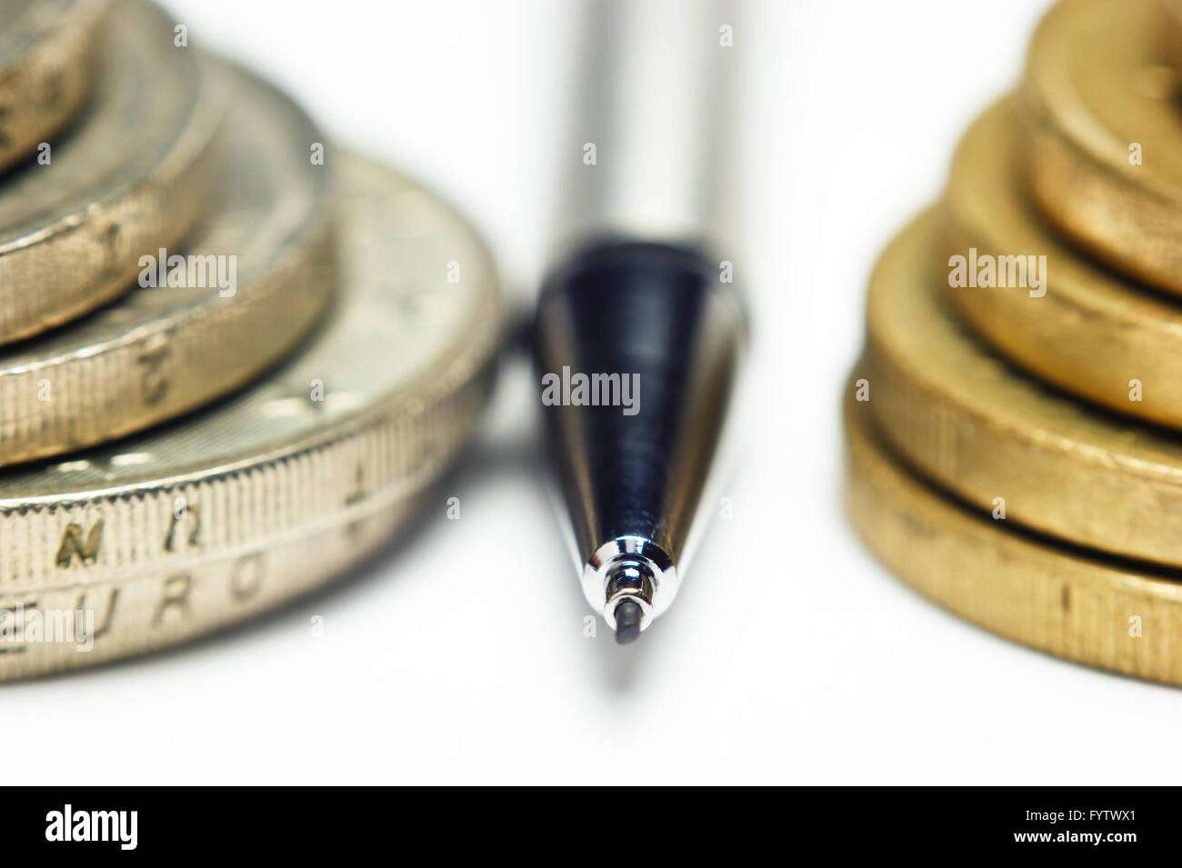 coins and pencil Stock Photo - Alamy
