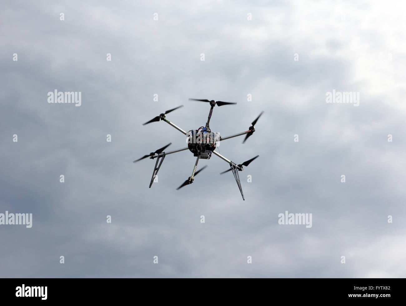 Flying drone in the sky with mounted digital camera Stock Photo - Alamy