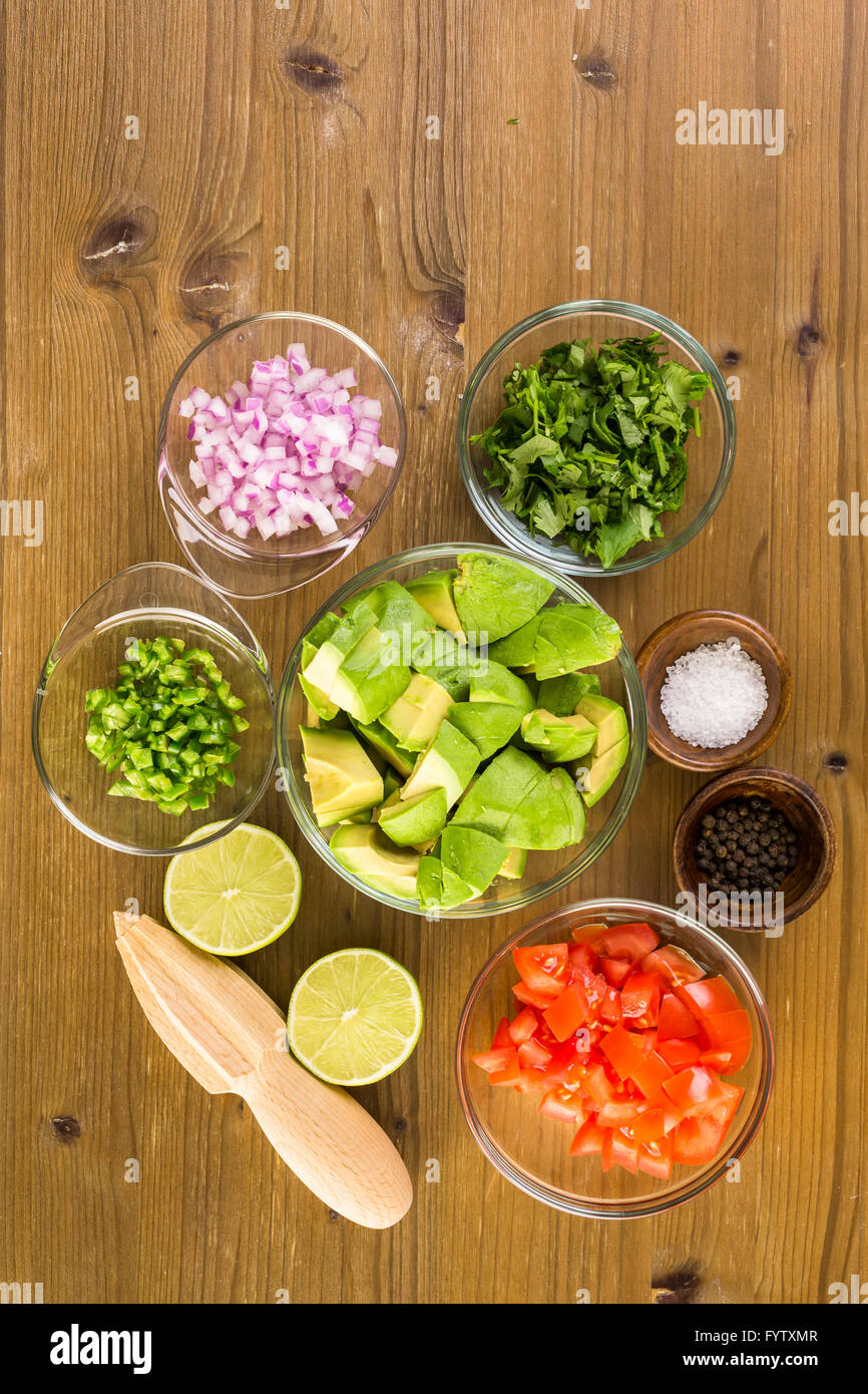 Preparing homemade guacamole from organic produce Stock Photo - Alamy