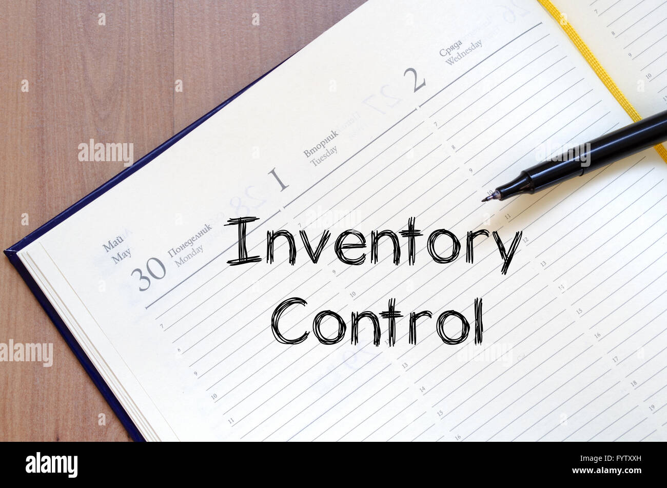 Inventory control write on notebook Stock Photo - Alamy