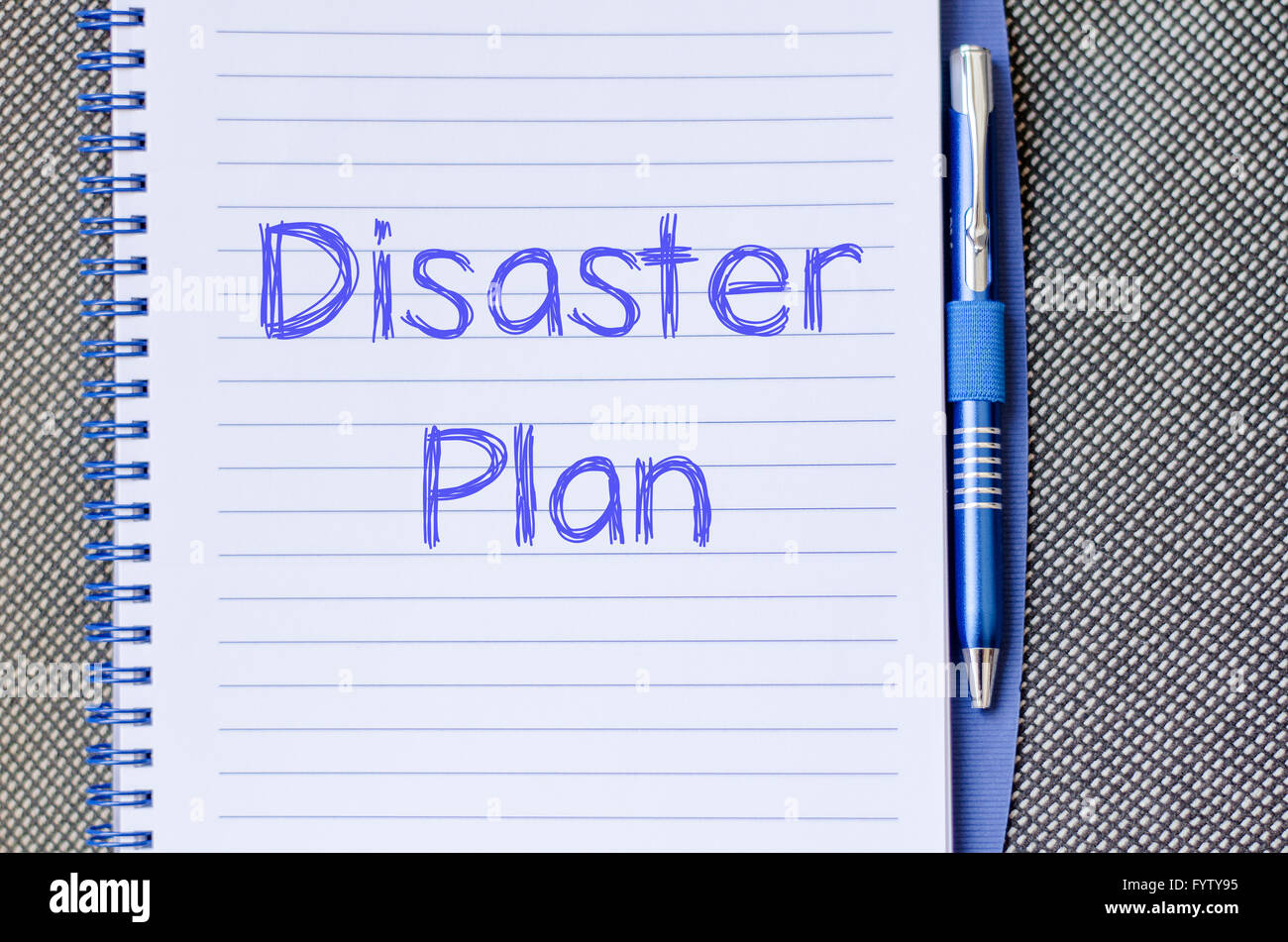 Disaster plan write on notebook Stock Photo - Alamy
