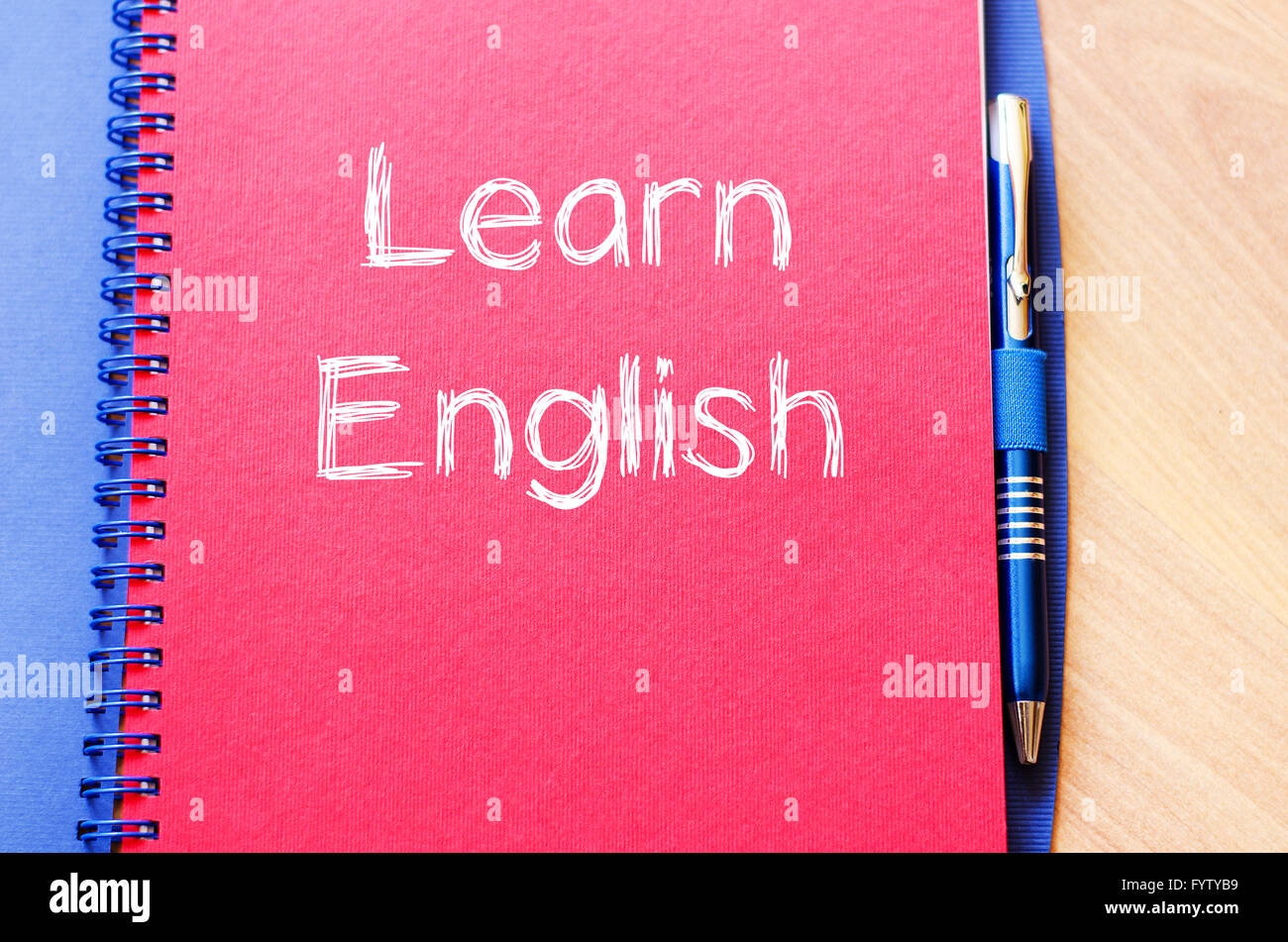 Learn english write on notebook Stock Photo - Alamy