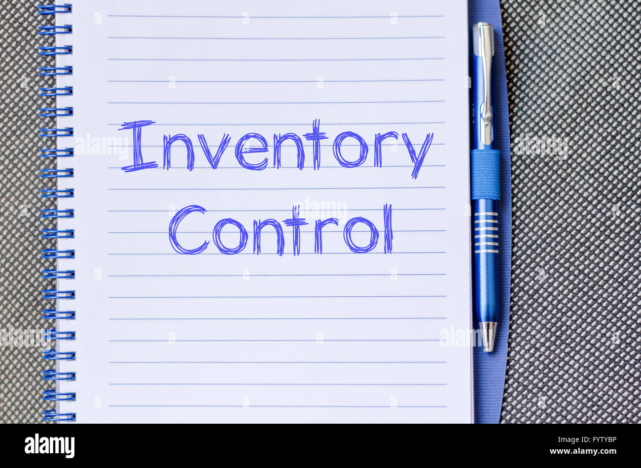 Inventory control write on notebook Stock Photo - Alamy