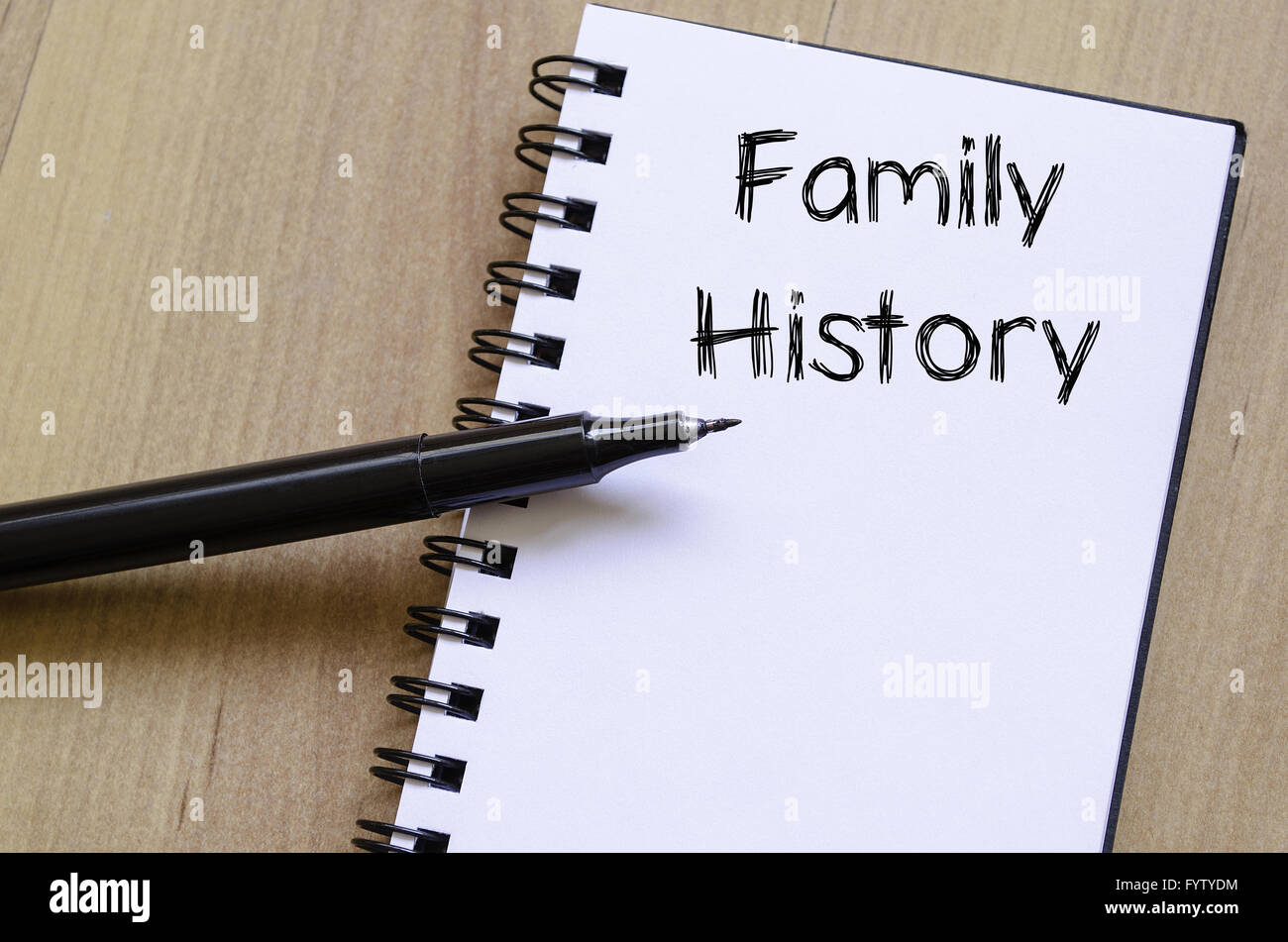 Family history write on notebook Stock Photo - Alamy