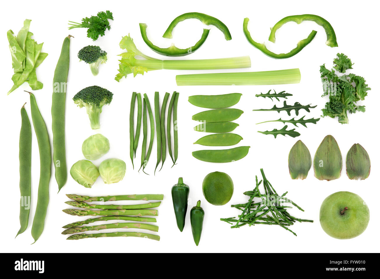 Green fresh vegetable and fruit selection over white background, high ...