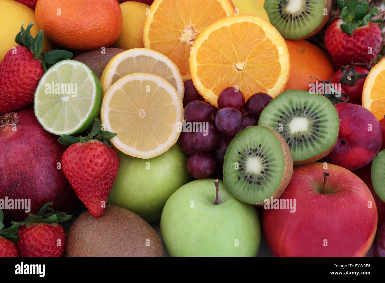 Healthy fresh fruit background with fruits high in antioxidants ...