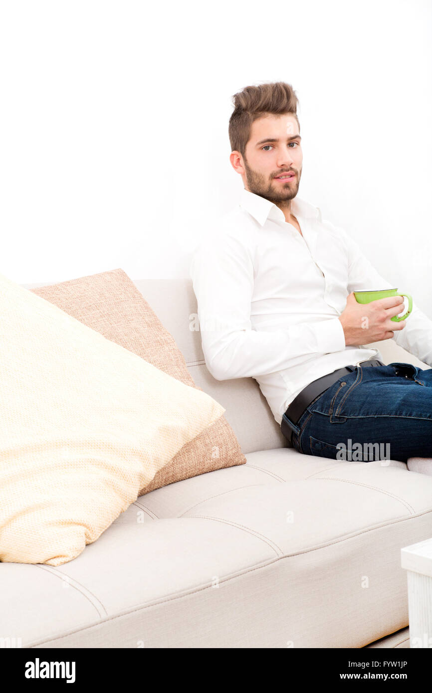 Couch portrait with coffee Stock Photo - Alamy