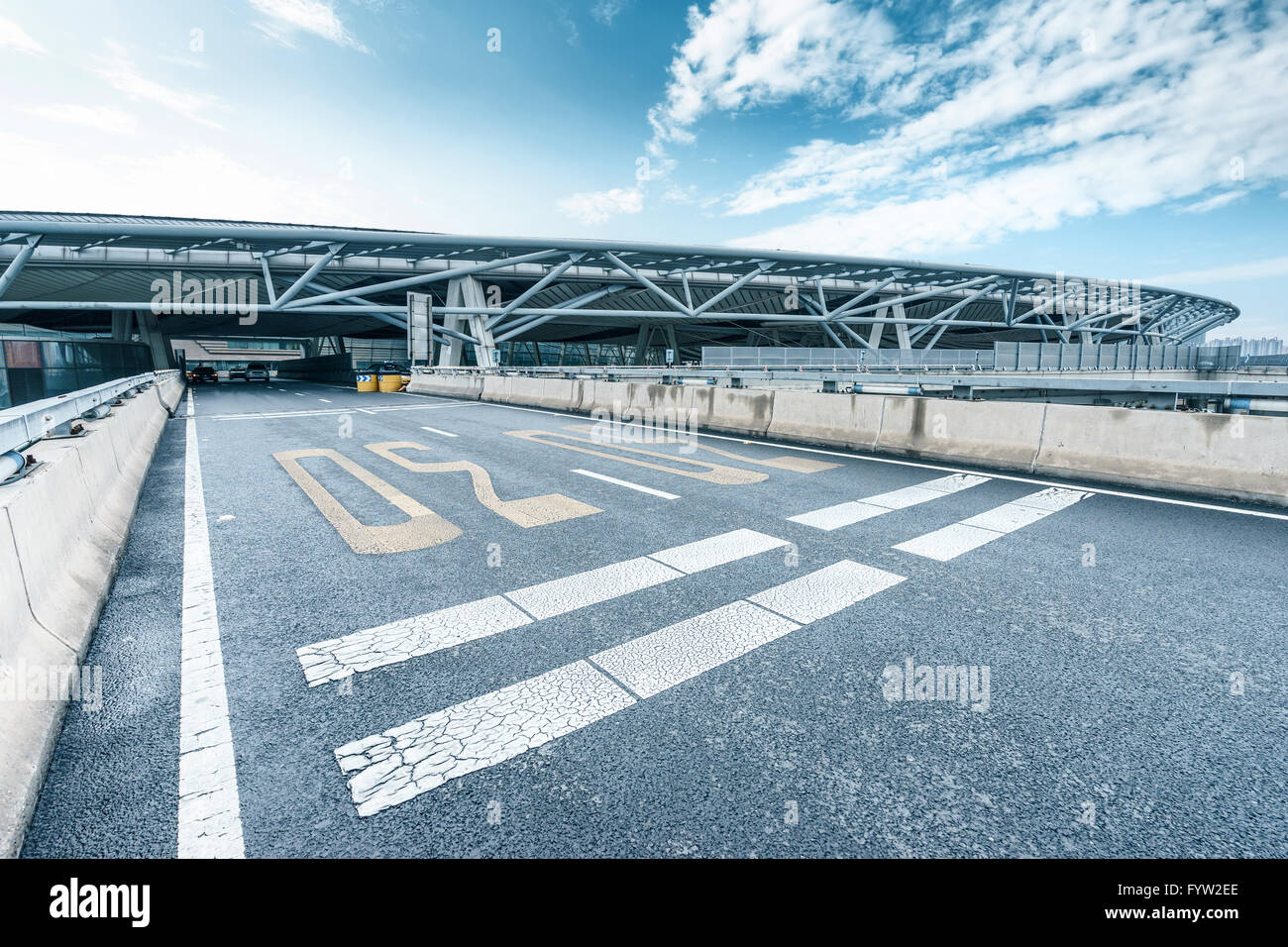 skyline and road through buildings Stock Photo - Alamy