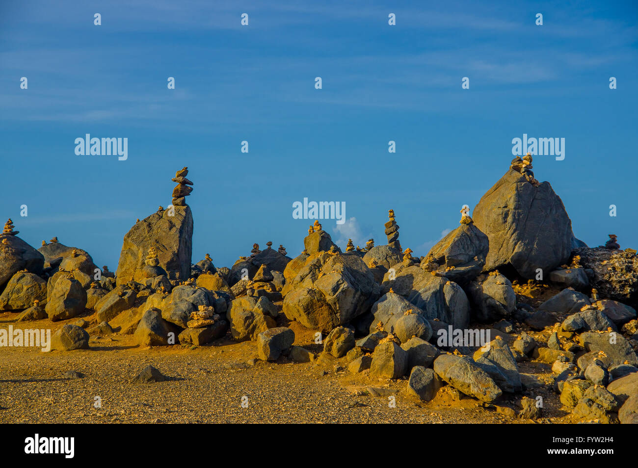 Stack of stones on sea shore, Aruba Stock Photo - Alamy