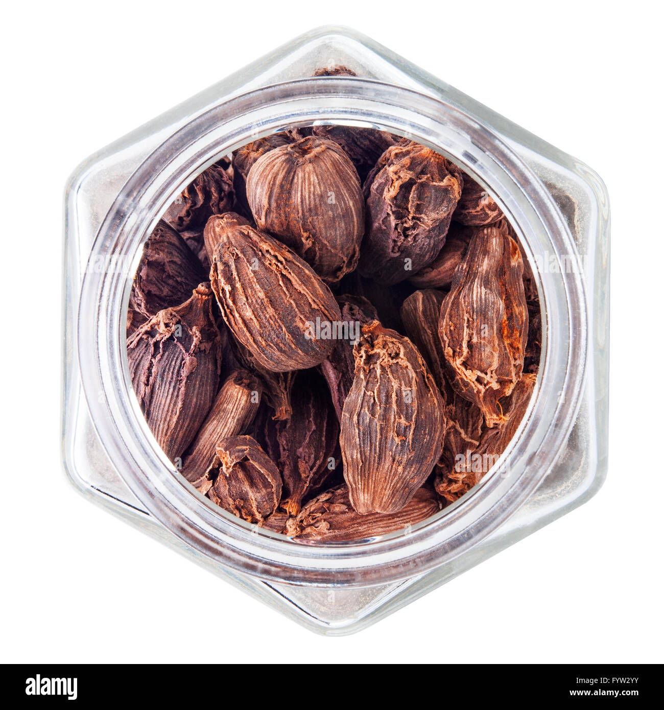 Black cardamom pods on white background Stock Photo - Alamy