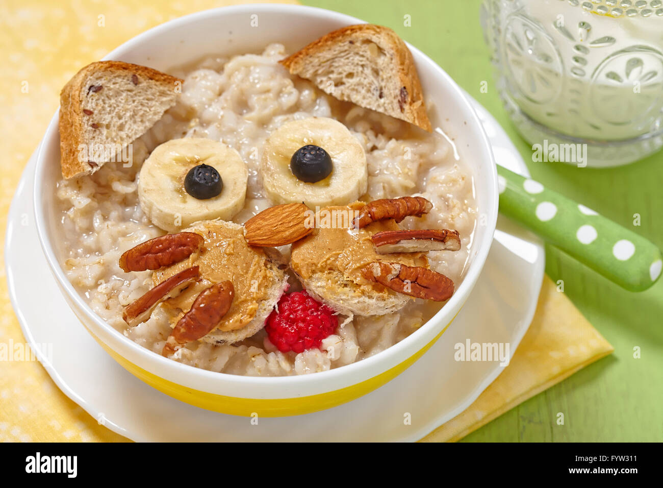 Funny oatmeal with cat face decoration Stock Photo - Alamy