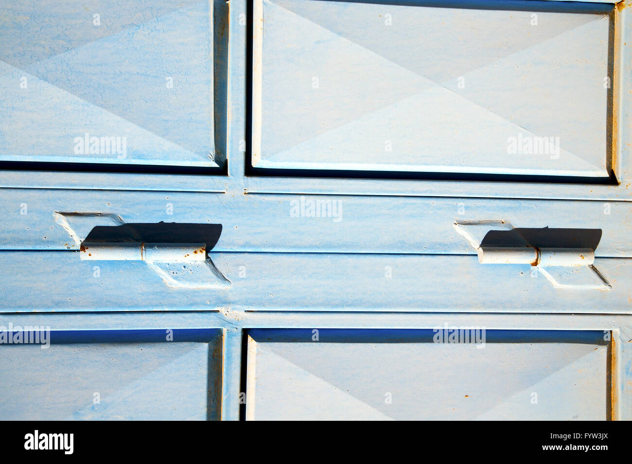 blue hinges o in africa the old wood facade Stock Photo - Alamy