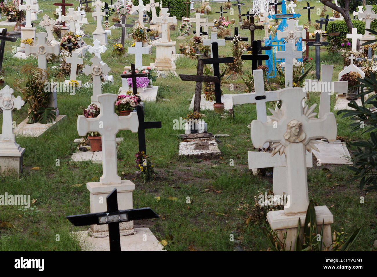 grave crosses at cemetery / graveyard Stock Photo - Alamy