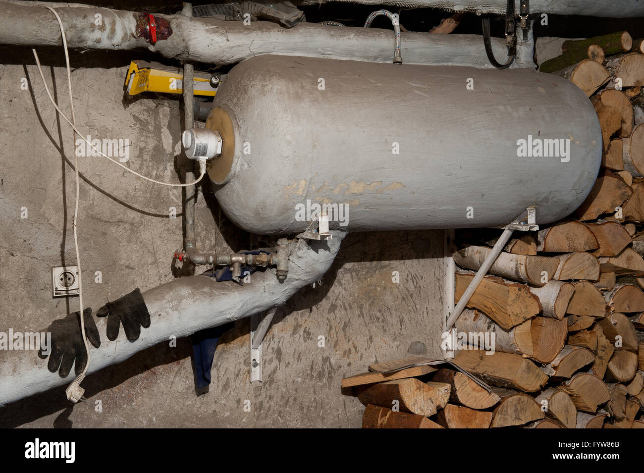Boiler in cellar interior, dark underground basement room under country ...