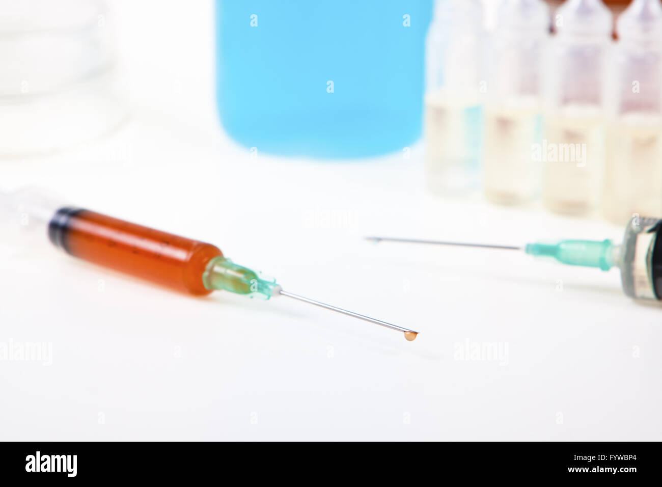 Blood drops syringe hi-res stock photography and images - Alamy